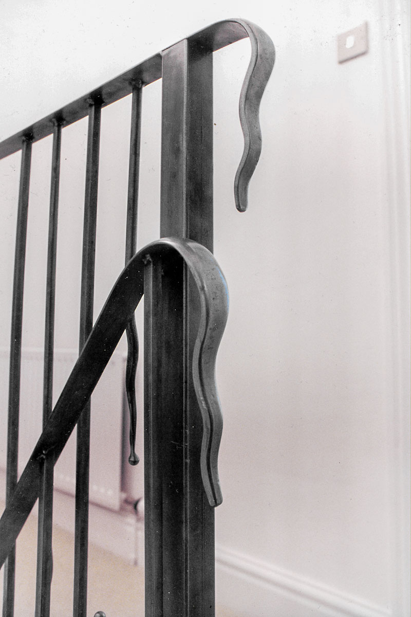 Quirky wrought iron stair rails