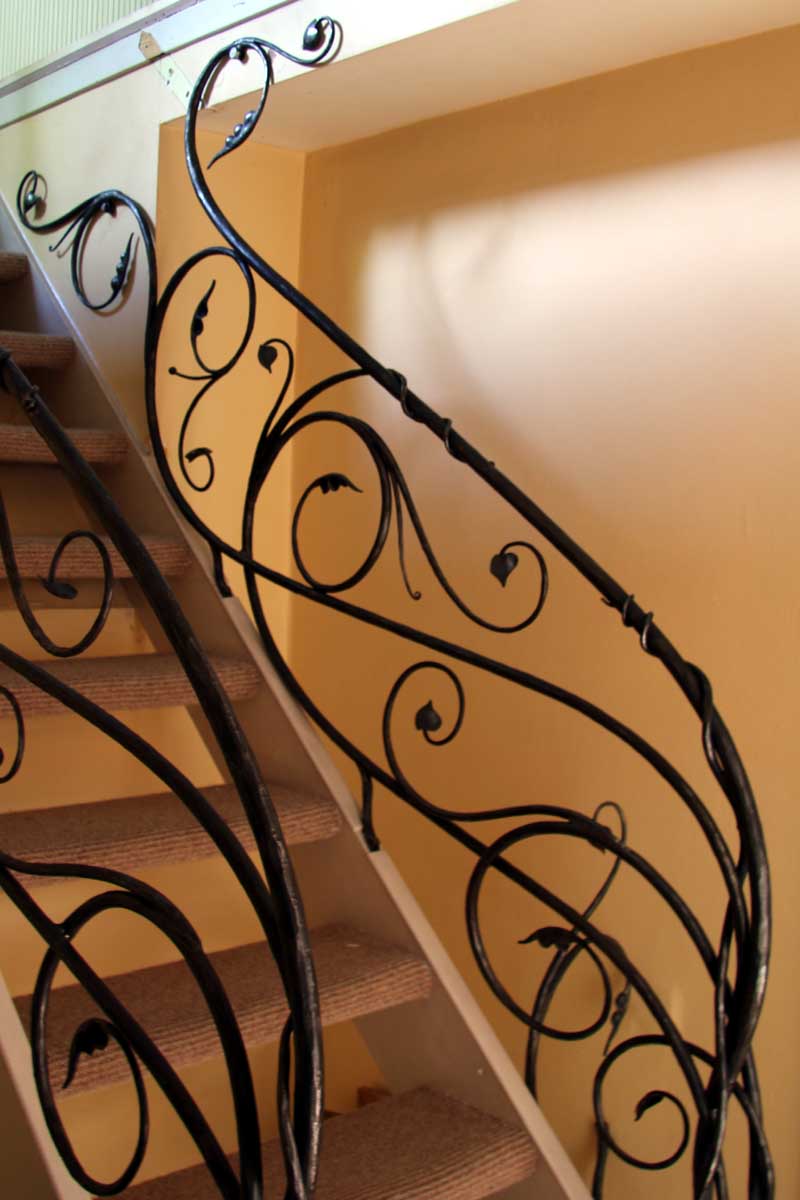 A Twisted and Entwined Metal Stair Railing